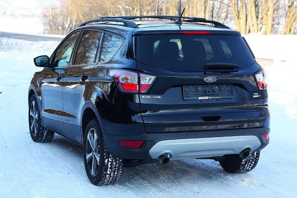 Black Ford Escape 2017 in Kretinga, with an engine capacity of 2.00 L and mileage of 133 thousand km for 11999 €, photo 9 on AUTOMOTO.COM.LV