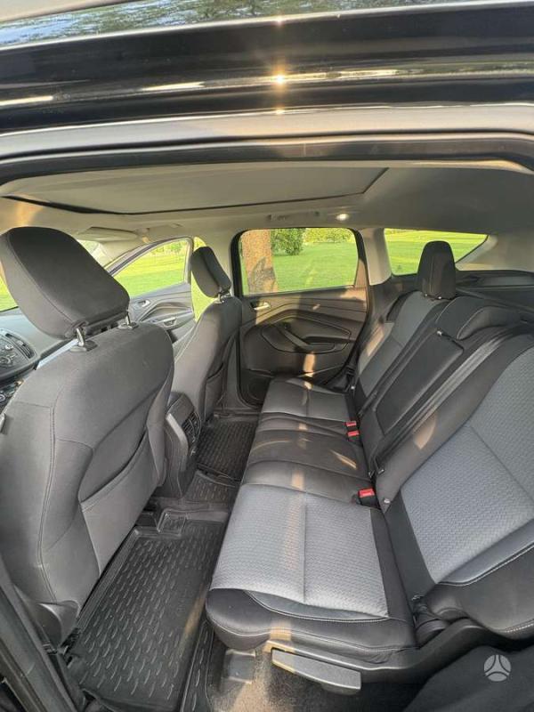 Black Ford Escape 2018 in Kaunas, with an engine capacity of 1.50 L and mileage of 173 thousand km for 8500 €, photo 6 on AUTOMOTO.COM.LV