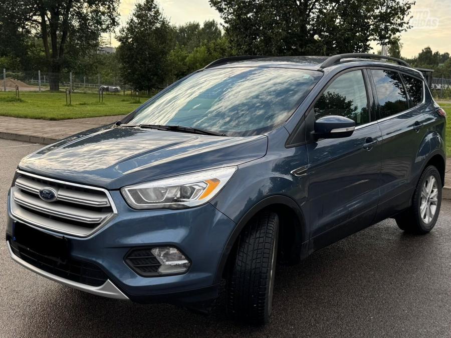 Zils Ford Escape 2018 Utena, ar dzinēja tilpumu 1.50 L un nobraukumu 74 tūkst. km par 9500 €, foto 1 vietnē AUTOMOTO.COM.LV