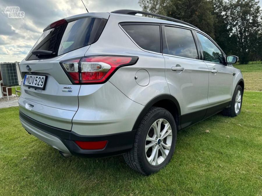 Grey Ford Escape 2018 in Utena, with an engine capacity of 1.50 L and mileage of 141 thousand km for 8888 €, photo 8 on AUTOMOTO.COM.LV