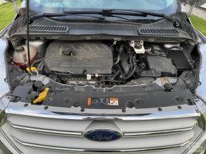 Grey Ford Escape 2018 in Utena, with an engine capacity of 1.50 L and mileage of 141 thousand km for 8888 €, photo 16 on AUTOMOTO.COM.LV
