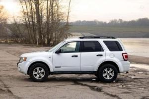White Ford Escape 2009 in Kaunas, with an engine capacity of 2.30 L and mileage of 275 thousand km for 4900 €, photo 13 on AUTOMOTO.COM.LV