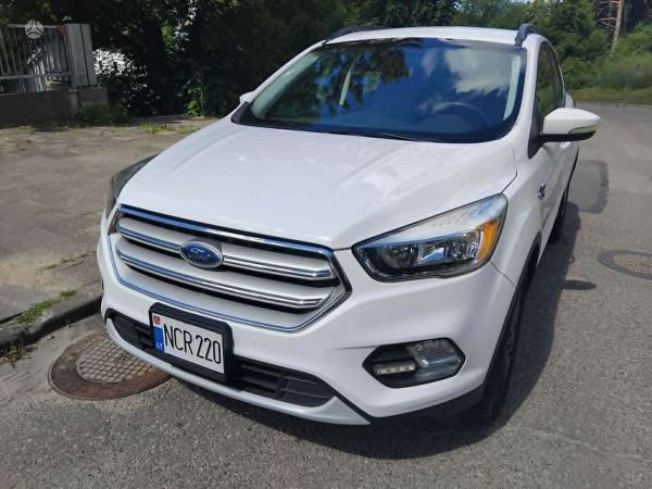 White Ford Escape 2018 in Vilnius, with an engine capacity of 1.50 L and mileage of 132 thousand km for 10700 €, photo 1 on AUTOMOTO.COM.LV
