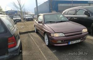 Violets Ford Escort 1992 Tallina, ar dzinēja tilpumu 1.80 L un nobraukumu 105 tūkst. km par 400 €, foto 6 vietnē AUTOMOTO.COM.LV
