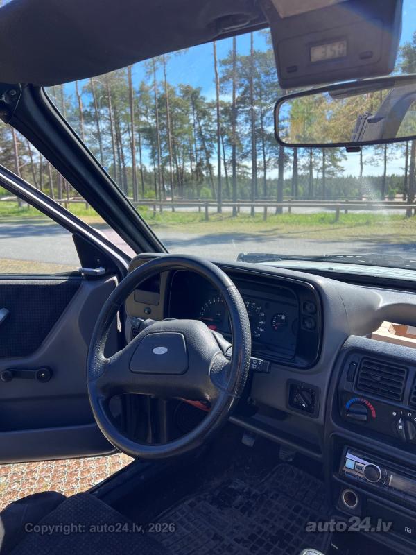 Balts Ford Escort 1990 Tallina, ar dzinēja tilpumu 1.60 L un nobraukumu 25 tūkst. km par 3900 €, foto 8 vietnē AUTOMOTO.COM.LV
