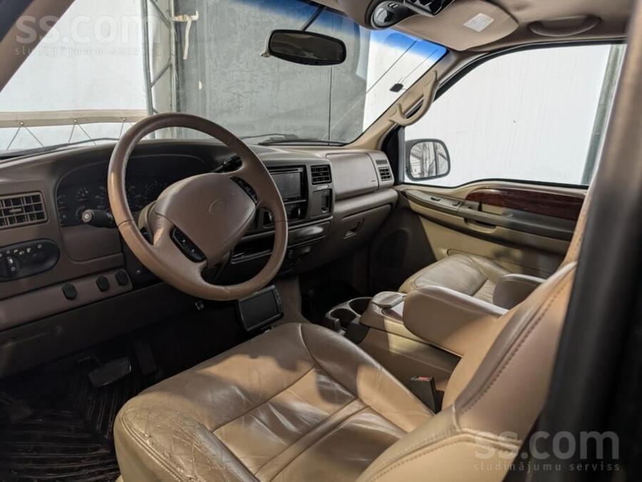 Melns Ford Excursion 2001 Rīga, ar dzinēja tilpumu 6.70 L un nobraukumu 299 tūkst. km par 12800 €, foto 13 vietnē AUTOMOTO.COM.LV