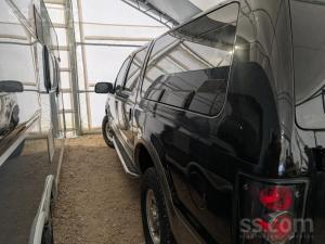 Melns Ford Excursion 2001 Rīga, ar dzinēja tilpumu 6.70 L un nobraukumu 299 tūkst. km par 11900 €, foto 6 vietnē AUTOMOTO.COM.LV