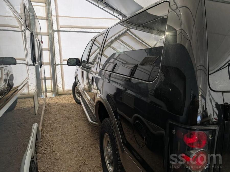 Melns Ford Excursion 2001 Rīga, ar dzinēja tilpumu 6.70 L un nobraukumu 299 tūkst. km par 11900 €, foto 6 vietnē AUTOMOTO.COM.LV