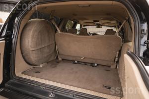 Black Ford Excursion 2002 in Jelgava, with an engine capacity of 7.00 L and mileage of 128 thousand km for 27000 €, photo 18 on AUTOMOTO.COM.LV