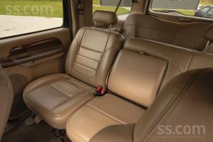 Black Ford Excursion 2002 in Jelgava, with an engine capacity of 7.00 L and mileage of 128 thousand km for 27000 €, photo 25 on AUTOMOTO.COM.LV