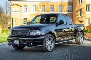 Black Ford F-150 2000 in Liepaja, with an engine capacity of 5.40 L and mileage of 223 thousand km for 14444 €, photo  on AUTOMOTO.COM.LV