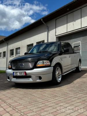 Black Ford F-150 2003 in Ogre, with an engine capacity of 5.40 L and mileage of 135 thousand km for 15600 €, photo  on AUTOMOTO.COM.LV