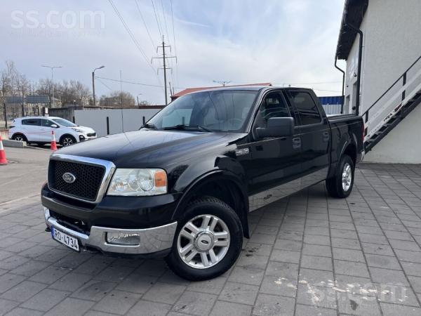 Black Ford F-150 2004 in Riga, with an engine capacity of 5.40 L and mileage of 0 thousand km for 7490 €, photo 1 on AUTOMOTO.COM.LV