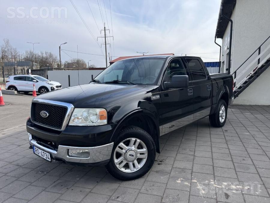 Black Ford F-150 2004 in Riga, with an engine capacity of 5.40 L and mileage of 0 thousand km for 7490 €, photo 1 on AUTOMOTO.COM.LV