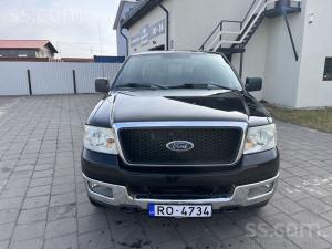 Black Ford F-150 2004 in Riga, with an engine capacity of 5.40 L and mileage of 0 thousand km for 7490 €, photo 4 on AUTOMOTO.COM.LV