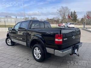 Black Ford F-150 2004 in Riga, with an engine capacity of 5.40 L and mileage of 0 thousand km for 7490 €, photo 6 on AUTOMOTO.COM.LV