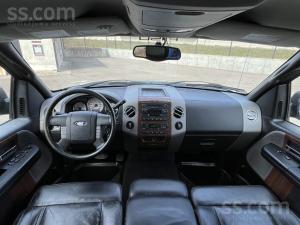 Black Ford F-150 2004 in Riga, with an engine capacity of 5.40 L and mileage of 0 thousand km for 7490 €, photo 11 on AUTOMOTO.COM.LV