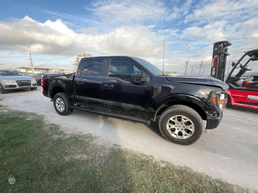 Black Ford F-150 2023 in Ukmerge, with an engine capacity of 3.49 L and mileage of 72 thousand km for 13490 €, photo 1 on AUTOMOTO.COM.LV