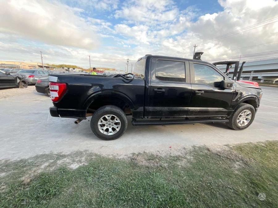 Black Ford F-150 2023 in Ukmerge, with an engine capacity of 3.49 L and mileage of 72 thousand km for 13490 €, photo 12 on AUTOMOTO.COM.LV