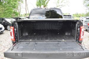 Black Ford F-150 2023 in Kuldiga, with an engine capacity of 3.50 L and mileage of 0 thousand km for 69550 €, photo 8 on AUTOMOTO.COM.LV
