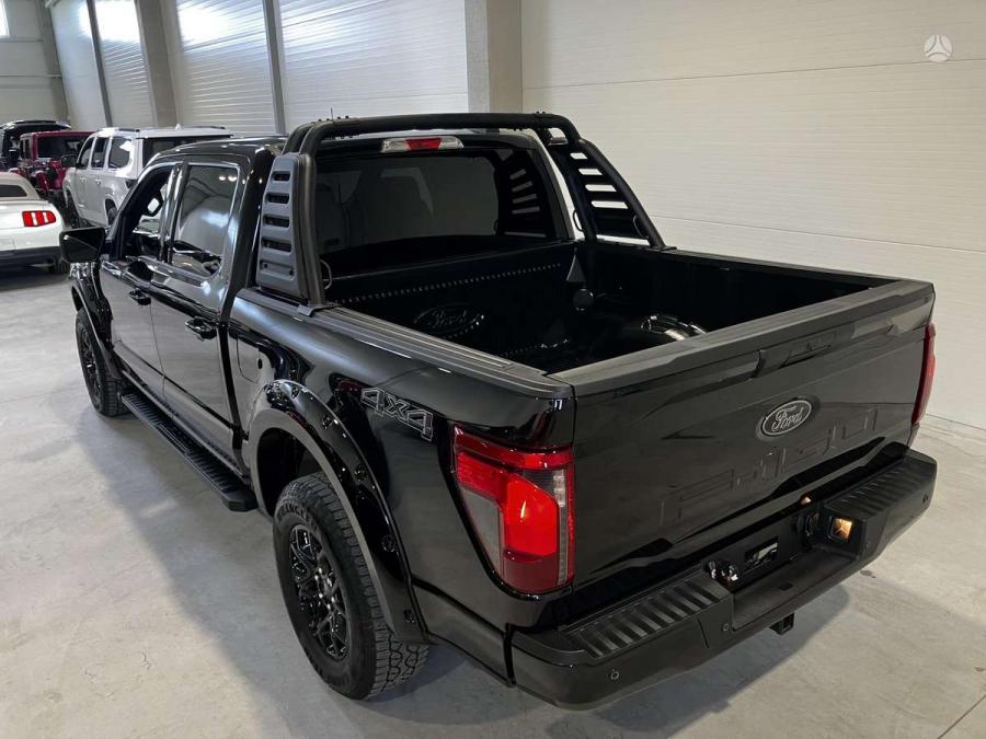 Black Ford F-150 2025 in Klaipeda, with an engine capacity of 2.70 L and mileage of 12 thousand km for 47190 €, photo 5 on AUTOMOTO.COM.LV