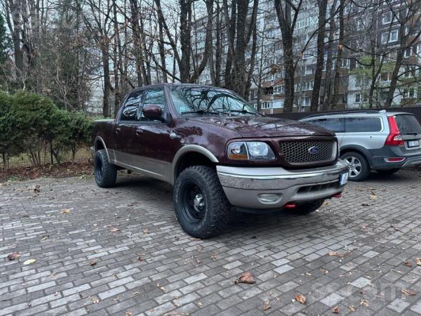 Red Ford F-150 2002 in Riga, with an engine capacity of 5.40 L and mileage of 190 thousand km for 10000 €, photo 3 on AUTOMOTO.COM.LV