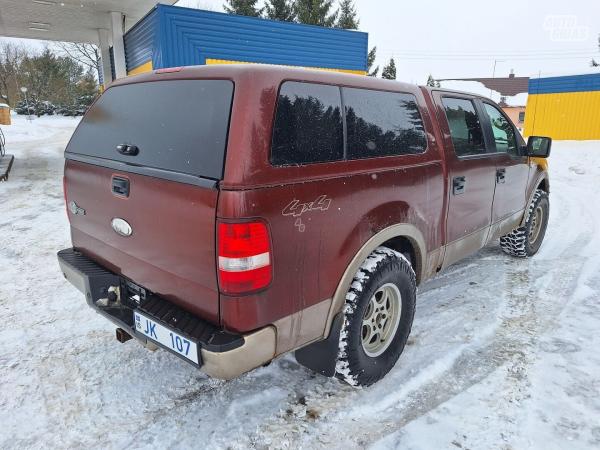 Red Ford F-150 2005 in Klaipeda, with an engine capacity of 5.40 L and mileage of 249 thousand km for 8777 €, photo 8 on AUTOMOTO.COM.LV
