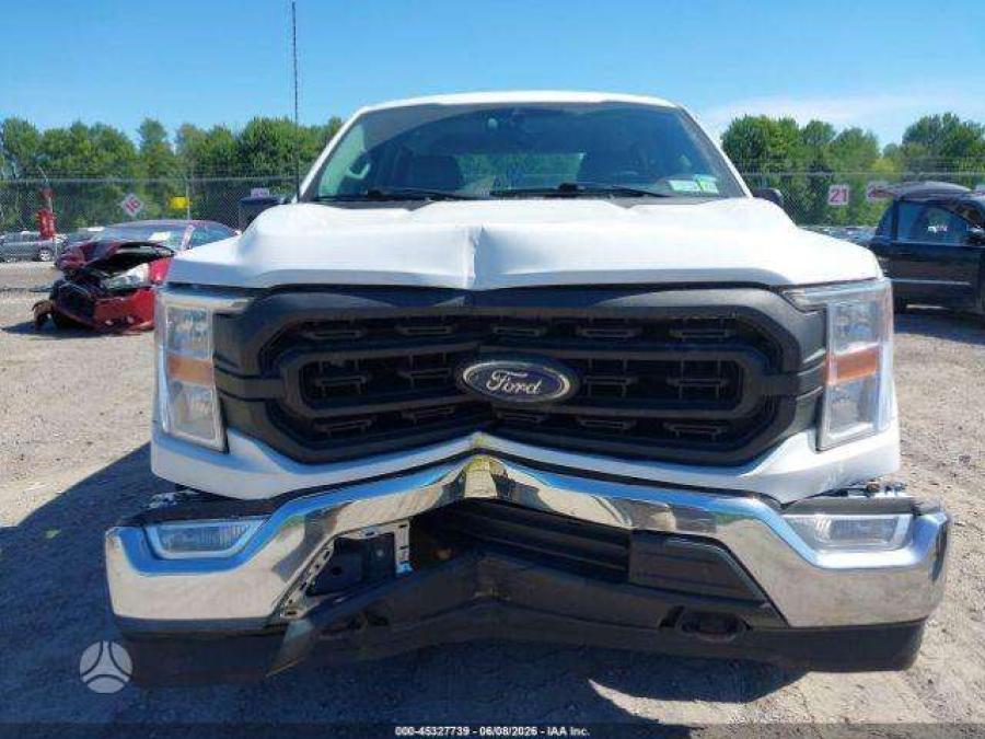 White Ford F-150 2021 in Klaipeda, with an engine capacity of 3.30 L and mileage of 210 thousand km for 5700 €, photo 14 on AUTOMOTO.COM.LV