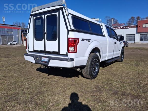 White Ford F-150 2015 in Daugavpils, with an engine capacity of 2.70 L and mileage of 130 thousand km for 19000 €, photo 10 on AUTOMOTO.COM.LV