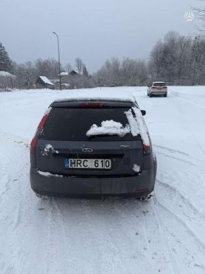 Black Ford Fiesta 2004 in Kaunas, with an engine capacity of 1.39 L and mileage of 225 thousand km for 360 €, photo 7 on AUTOMOTO.COM.LV
