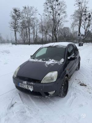 Black Ford Fiesta 2004 in Kaunas, with an engine capacity of 1.39 L and mileage of 225 thousand km for 360 €, photo 10 on AUTOMOTO.COM.LV