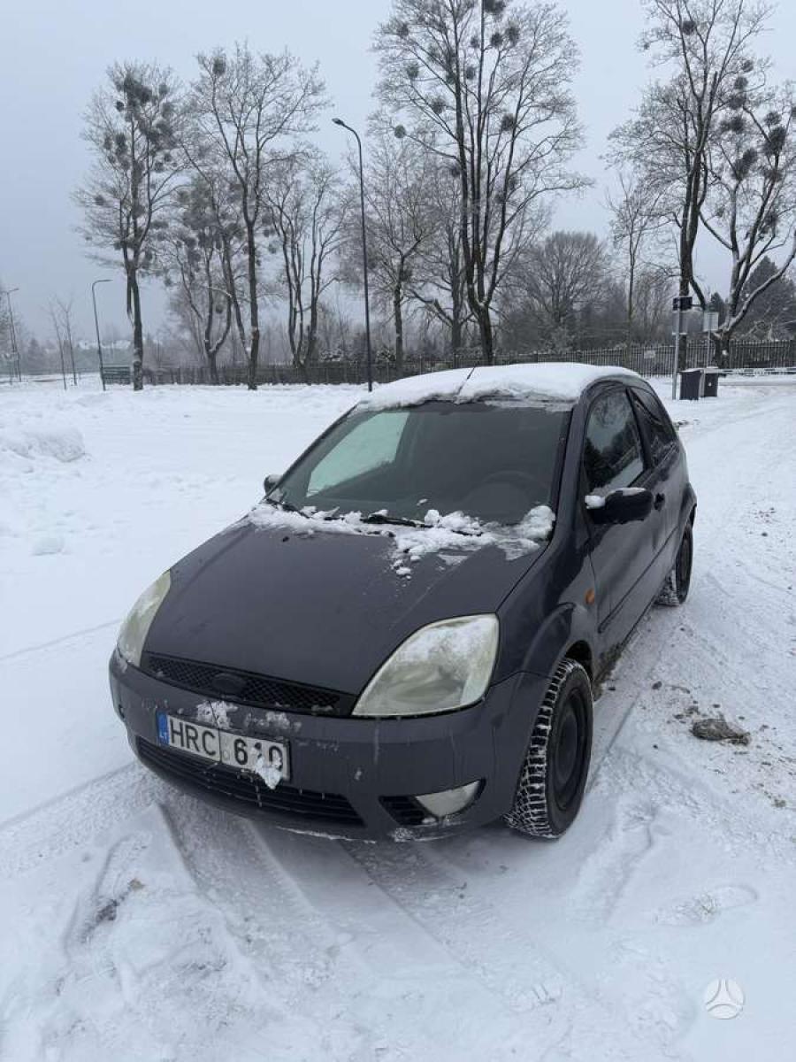 Black Ford Fiesta 2004 in Kaunas, with an engine capacity of 1.39 L and mileage of 225 thousand km for 360 €, photo 10 on AUTOMOTO.COM.LV