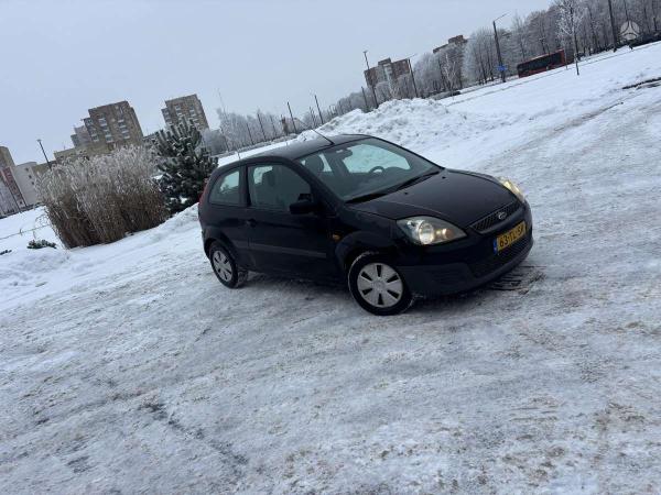 Black Ford Fiesta 2006 in Kaunas, with an engine capacity of 1.30 L and mileage of 178 thousand km for 950 €, photo 1 on AUTOMOTO.COM.LV