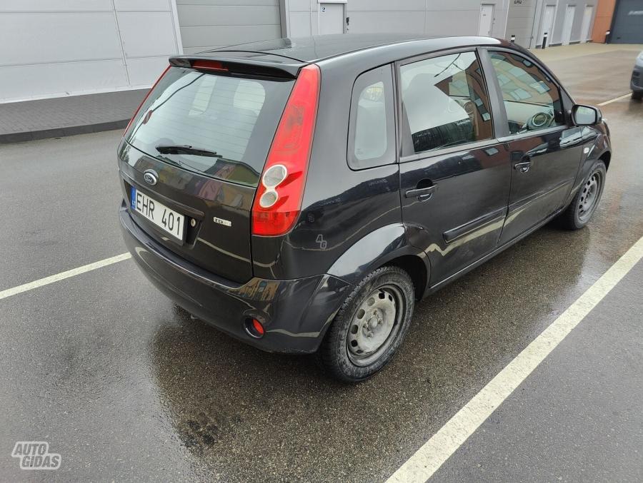 Black Ford Fiesta 2008 in Vilnius, with an engine capacity of 1.40 L and mileage of 115 thousand km for 1500 €, photo 4 on AUTOMOTO.COM.LV