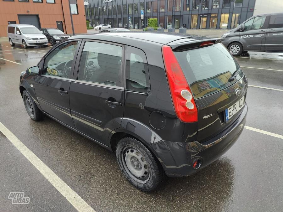 Black Ford Fiesta 2008 in Vilnius, with an engine capacity of 1.40 L and mileage of 115 thousand km for 1500 €, photo 5 on AUTOMOTO.COM.LV