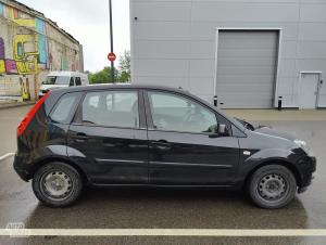 Black Ford Fiesta 2008 in Vilnius, with an engine capacity of 1.40 L and mileage of 115 thousand km for 1500 €, photo 6 on AUTOMOTO.COM.LV