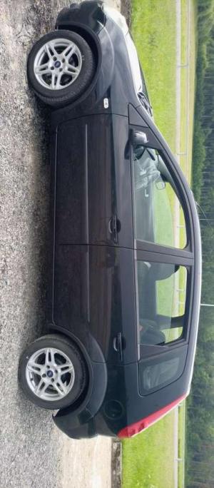 Black Ford Fiesta 2008 in Naujoji Akmene, with an engine capacity of 1.40 L and mileage of 227 thousand km for 1700 €, photo 4 on AUTOMOTO.COM.LV