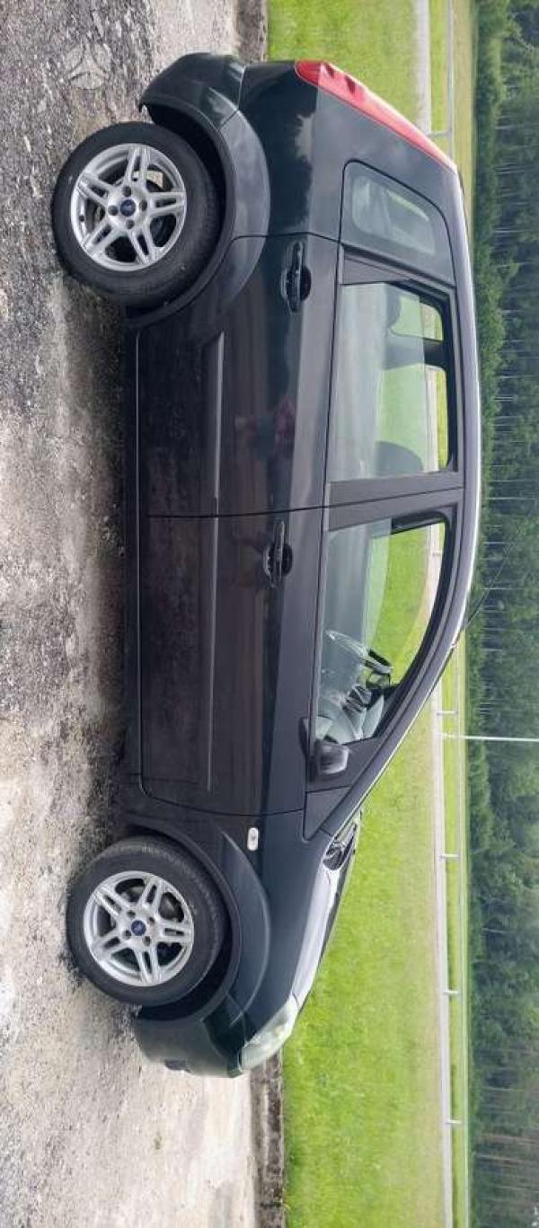 Black Ford Fiesta 2008 in Naujoji Akmene, with an engine capacity of 1.40 L and mileage of 227 thousand km for 1700 €, photo 4 on AUTOMOTO.COM.LV