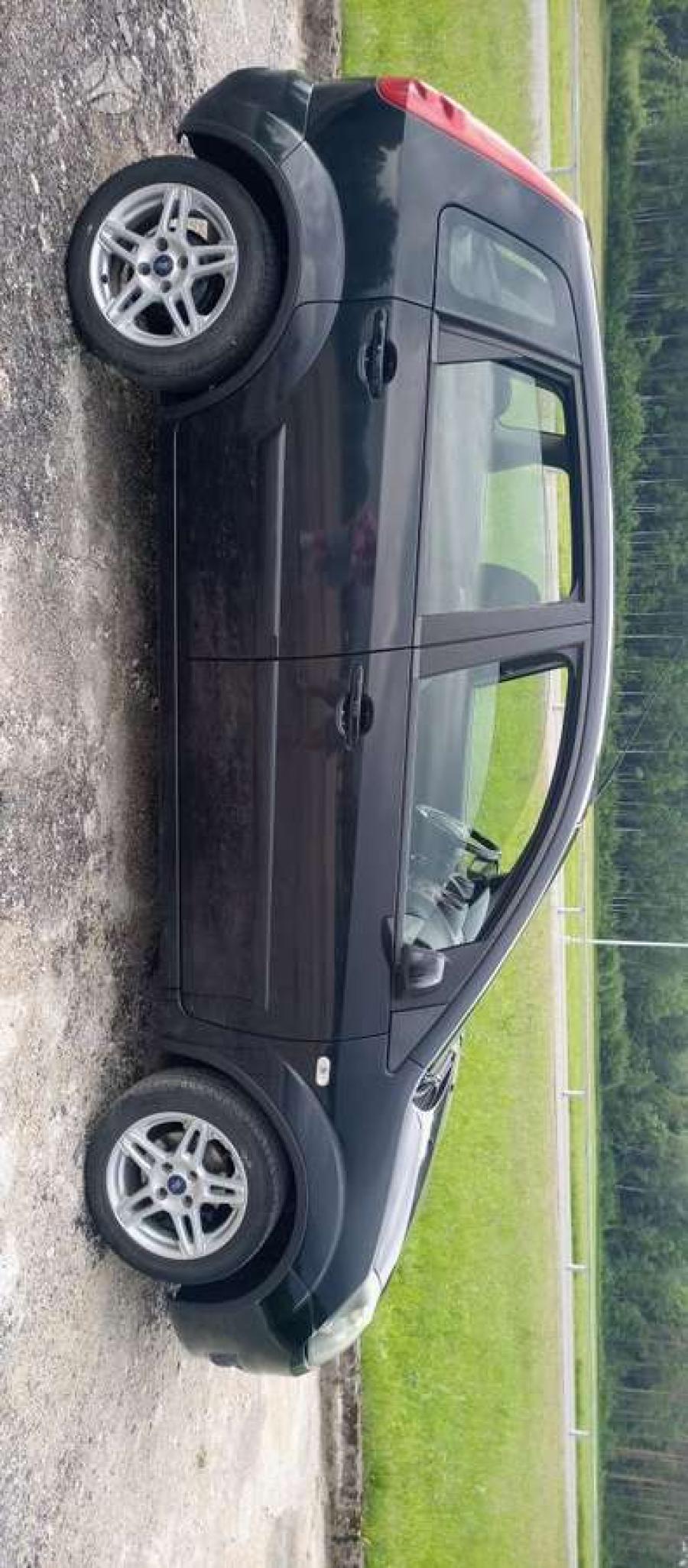 Black Ford Fiesta 2008 in Naujoji Akmene, with an engine capacity of 1.40 L and mileage of 227 thousand km for 1700 €, photo 5 on AUTOMOTO.COM.LV