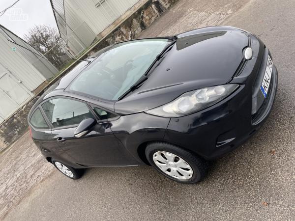 Black Ford Fiesta 2009 in Alytus, with an engine capacity of 1.60 L and mileage of 280 thousand km for 1600 €, photo 9 on AUTOMOTO.COM.LV