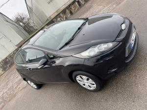 Black Ford Fiesta 2009 in Alytus, with an engine capacity of 1.60 L and mileage of 280 thousand km for 1600 €, photo 9 on AUTOMOTO.COM.LV