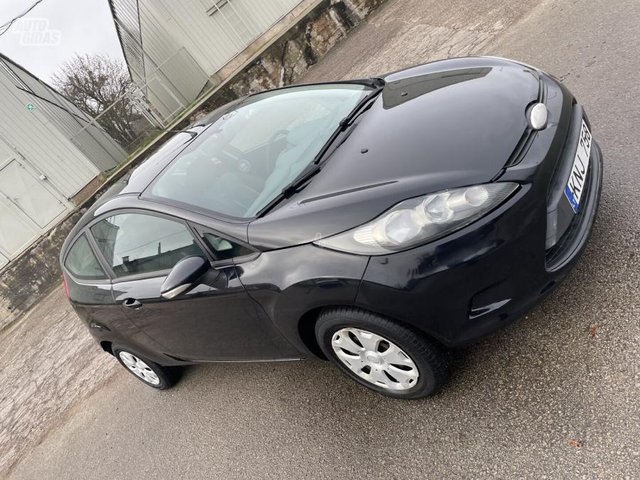 Black Ford Fiesta 2009 in Alytus, with an engine capacity of 1.60 L and mileage of 280 thousand km for 1600 €, photo 9 on AUTOMOTO.COM.LV
