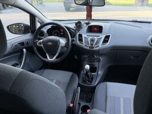 Black Ford Fiesta 2009 in Elektrenai, with an engine capacity of 1.60 L and mileage of 164 thousand km for 2200 €, photo 11 on AUTOMOTO.COM.LV