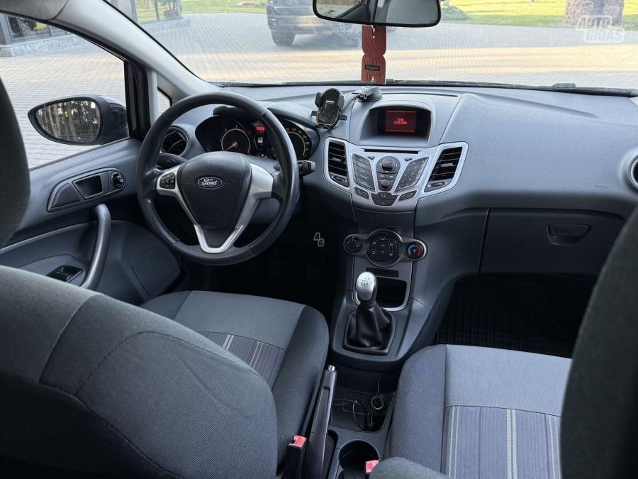 Black Ford Fiesta 2009 in Elektrenai, with an engine capacity of 1.60 L and mileage of 164 thousand km for 2200 €, photo 11 on AUTOMOTO.COM.LV