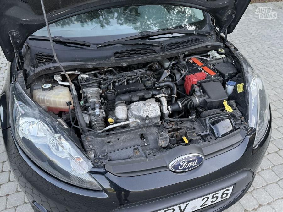 Black Ford Fiesta 2009 in Elektrenai, with an engine capacity of 1.60 L and mileage of 164 thousand km for 2200 €, photo 13 on AUTOMOTO.COM.LV