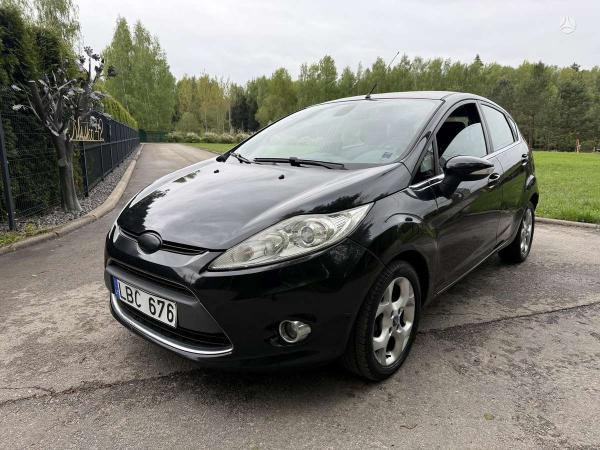 Melns Ford Fiesta 2009 Kauņa, ar dzinēja tilpumu 1.56 L un nobraukumu 294 tūkst. km par 2100 €, foto 2 vietnē AUTOMOTO.COM.LV