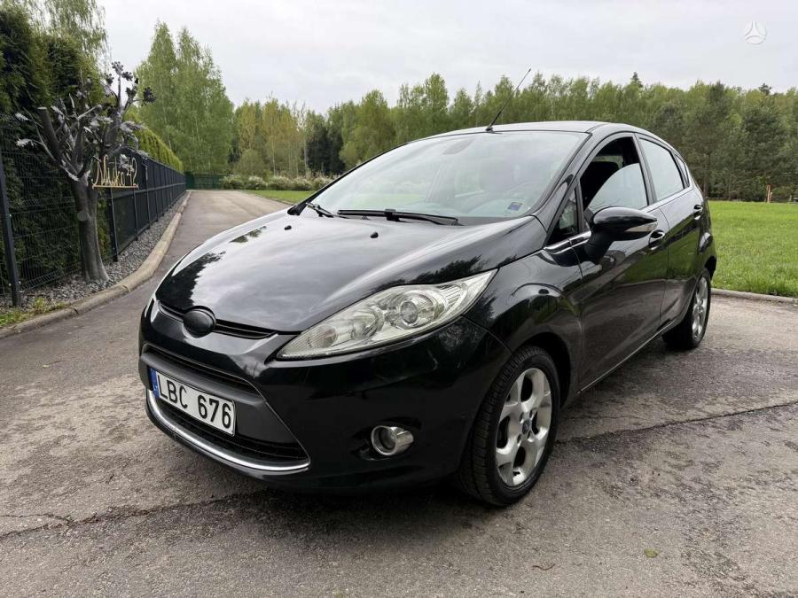 Black Ford Fiesta 2009 in Kaunas, with an engine capacity of 1.56 L and mileage of 294 thousand km for 2100 €, photo 3 on AUTOMOTO.COM.LV
