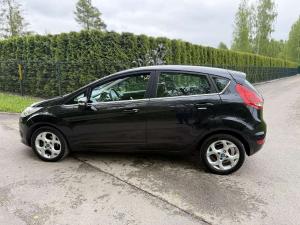 Black Ford Fiesta 2009 in Kaunas, with an engine capacity of 1.56 L and mileage of 294 thousand km for 2100 €, photo 4 on AUTOMOTO.COM.LV