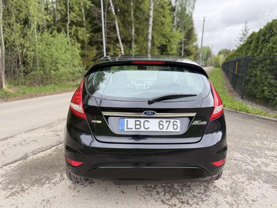 Black Ford Fiesta 2009 in Kaunas, with an engine capacity of 1.56 L and mileage of 294 thousand km for 2100 €, photo 6 on AUTOMOTO.COM.LV