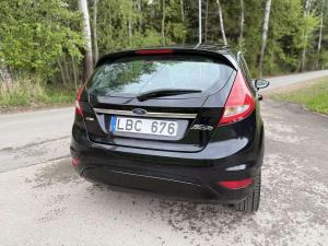 Black Ford Fiesta 2009 in Kaunas, with an engine capacity of 1.56 L and mileage of 294 thousand km for 2100 €, photo 7 on AUTOMOTO.COM.LV